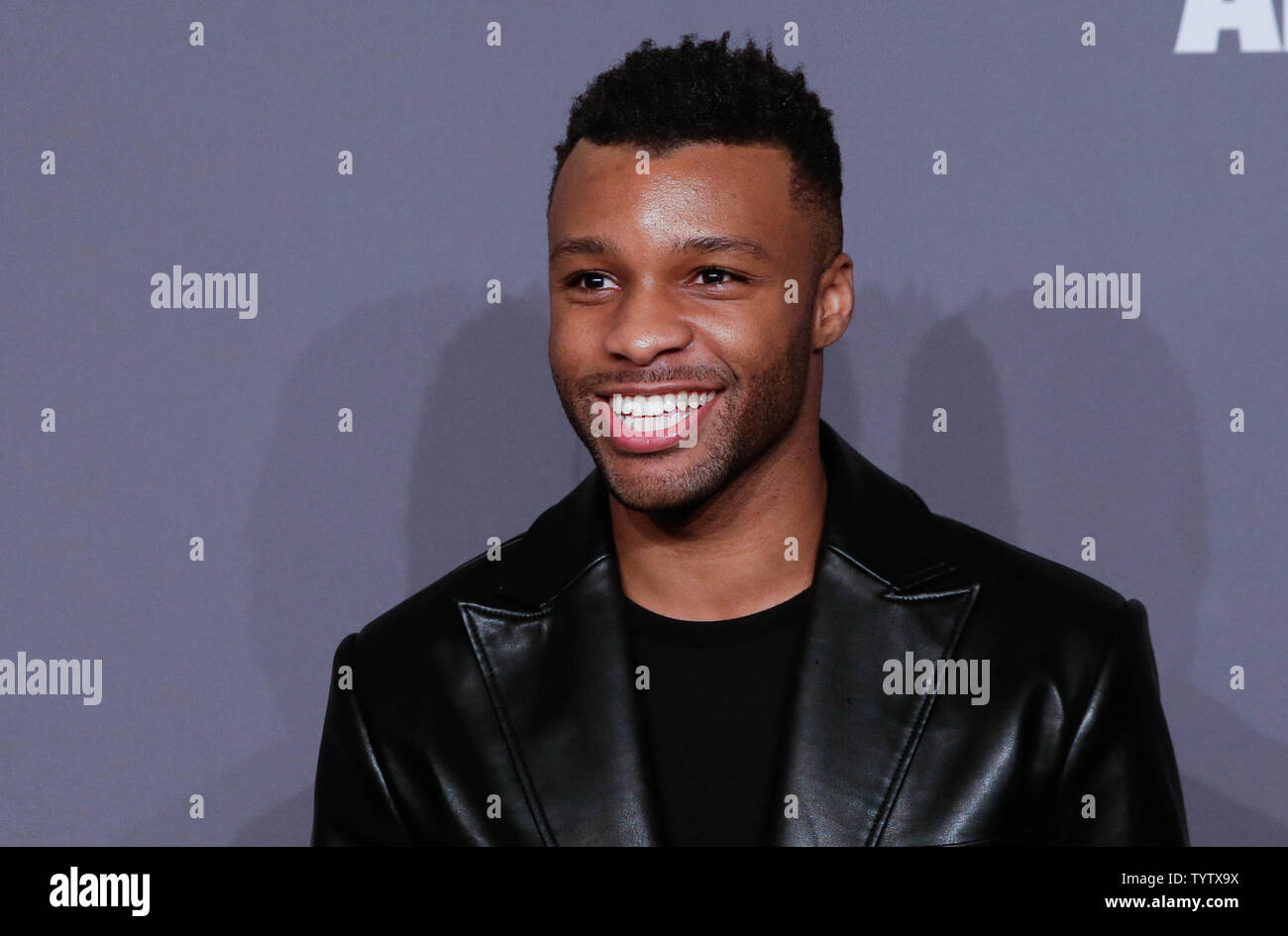 Dyllón Burnside arrives on the red carpet at the amfAR New York Gala ...