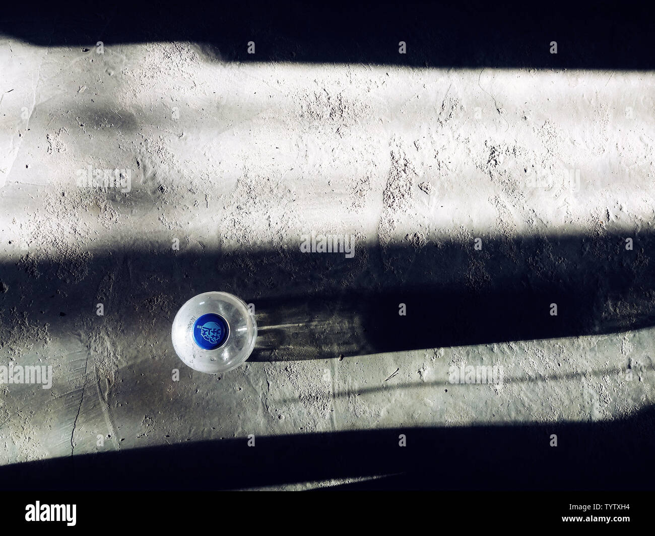 Plastic bottles in light Stock Photo - Alamy