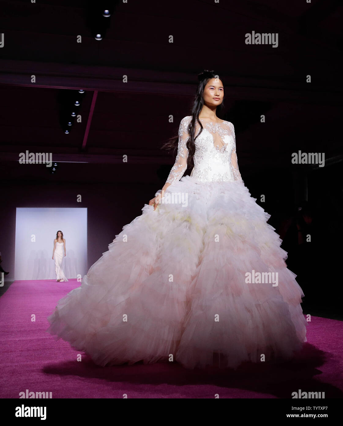 Model Varsha Thapa walks on the runway for the Lanyu fashion show ...