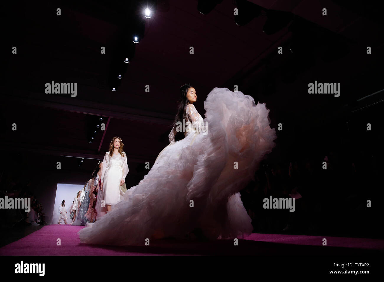 Model Varsha Thapa walks on the runway for the Lanyu fashion show ...