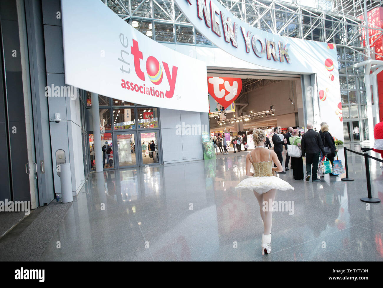 Attendees walk through the exhibit at the at 116th American ...
