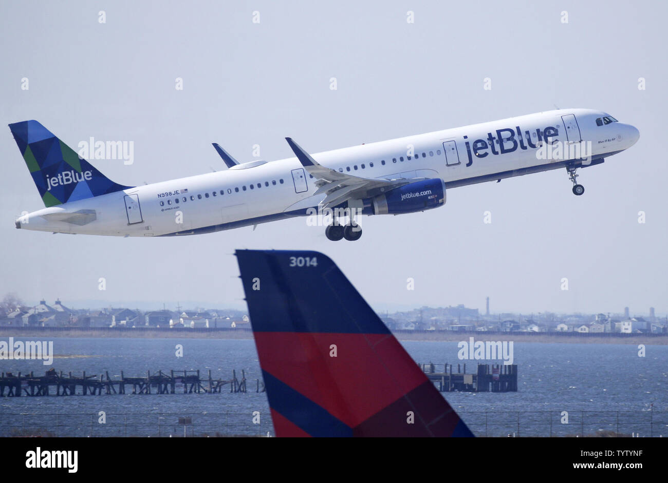 A JetBlue plane takes off one day after the crash of Ethiopian Airways ...