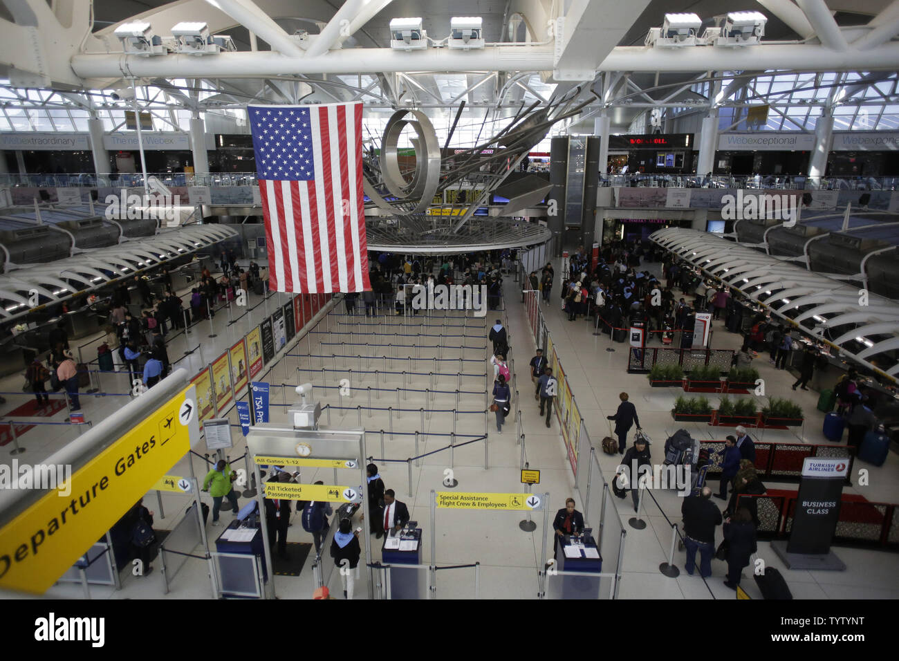 Travelers walk with luggage one day after the crash of Ethiopian ...