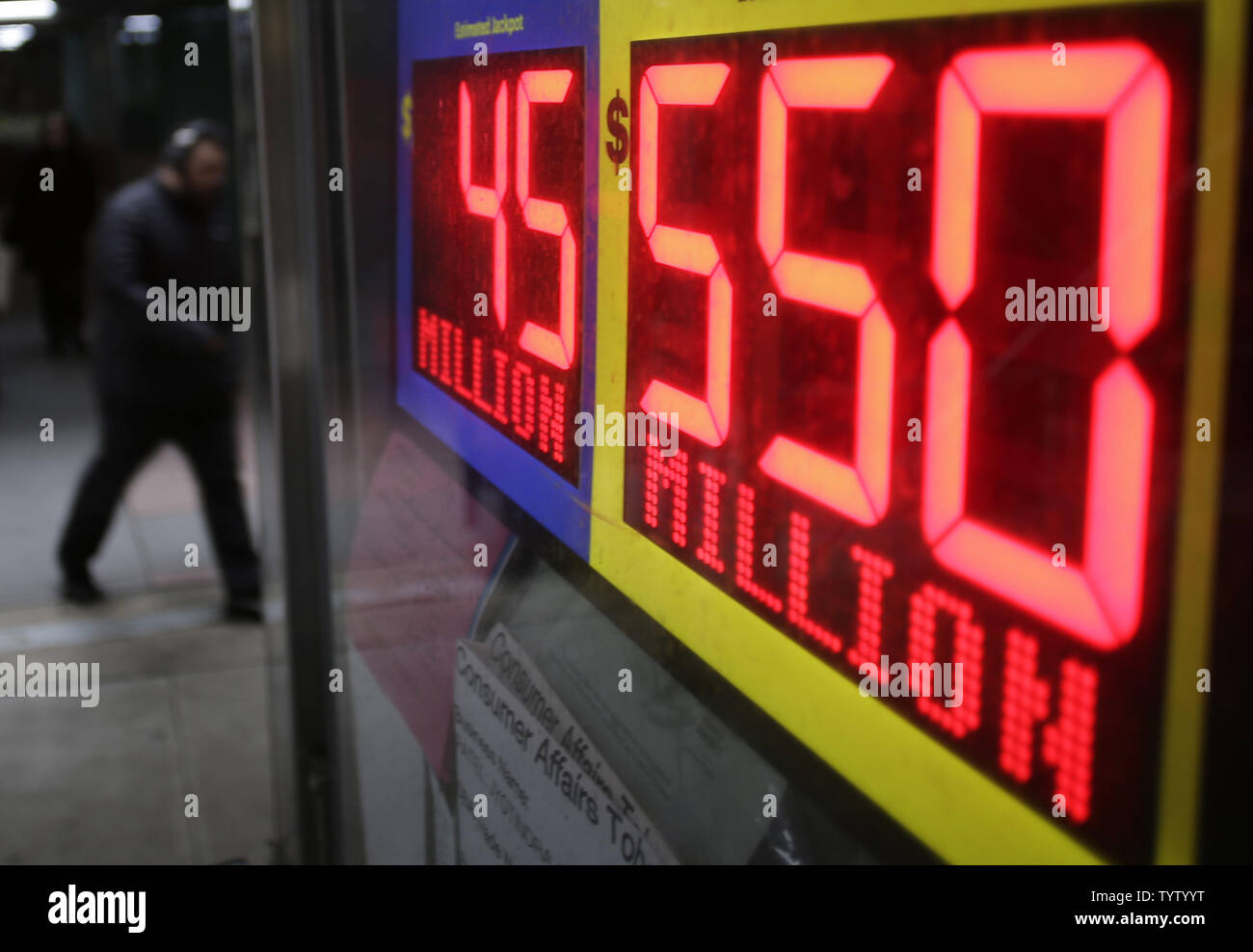 A Powerball jackpot sign at a news stand in Manhattan shows the jackpot ...