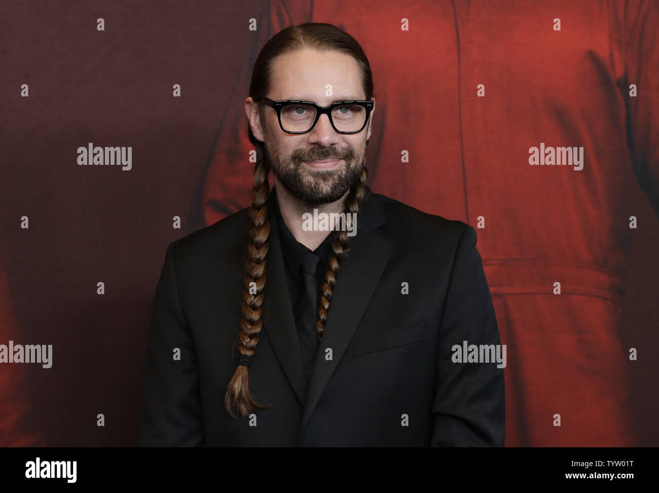 Ian Cooper arrives on the red carpet at the 'US' New York Premiere at The Museum of Modern Art ...