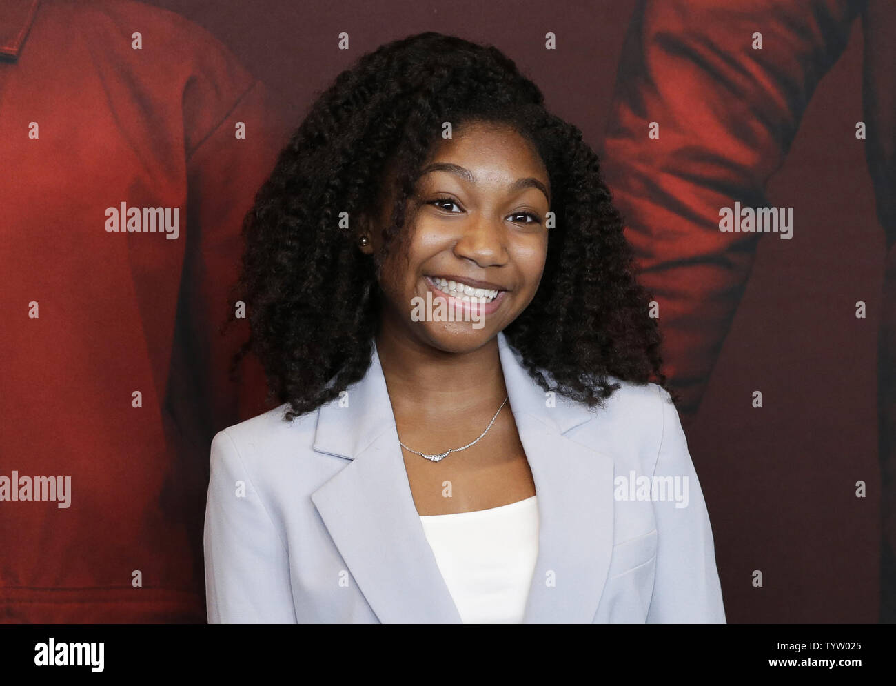 Ashley Mckoy arrives on the red carpet at the 'US' New York Premiere at ...