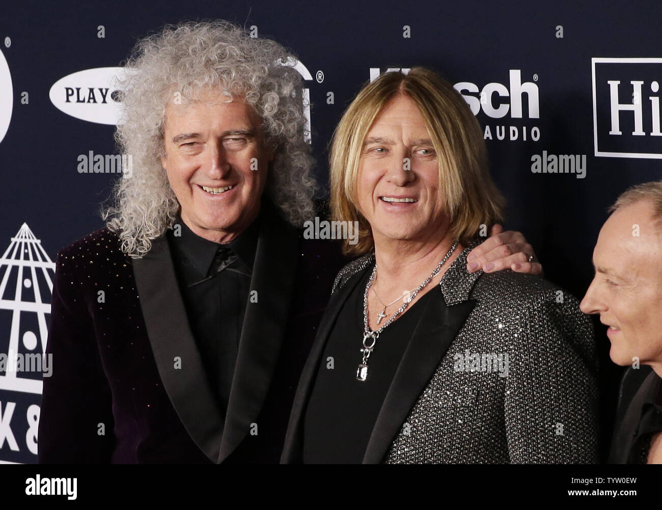Brian May and Joe Elliot arrive on the red carpet at the 34th annual ...