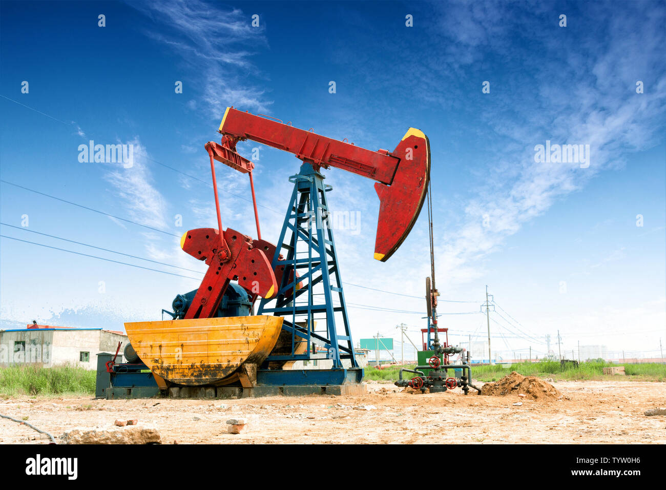 Oil well and bluesky Stock Photo - Alamy