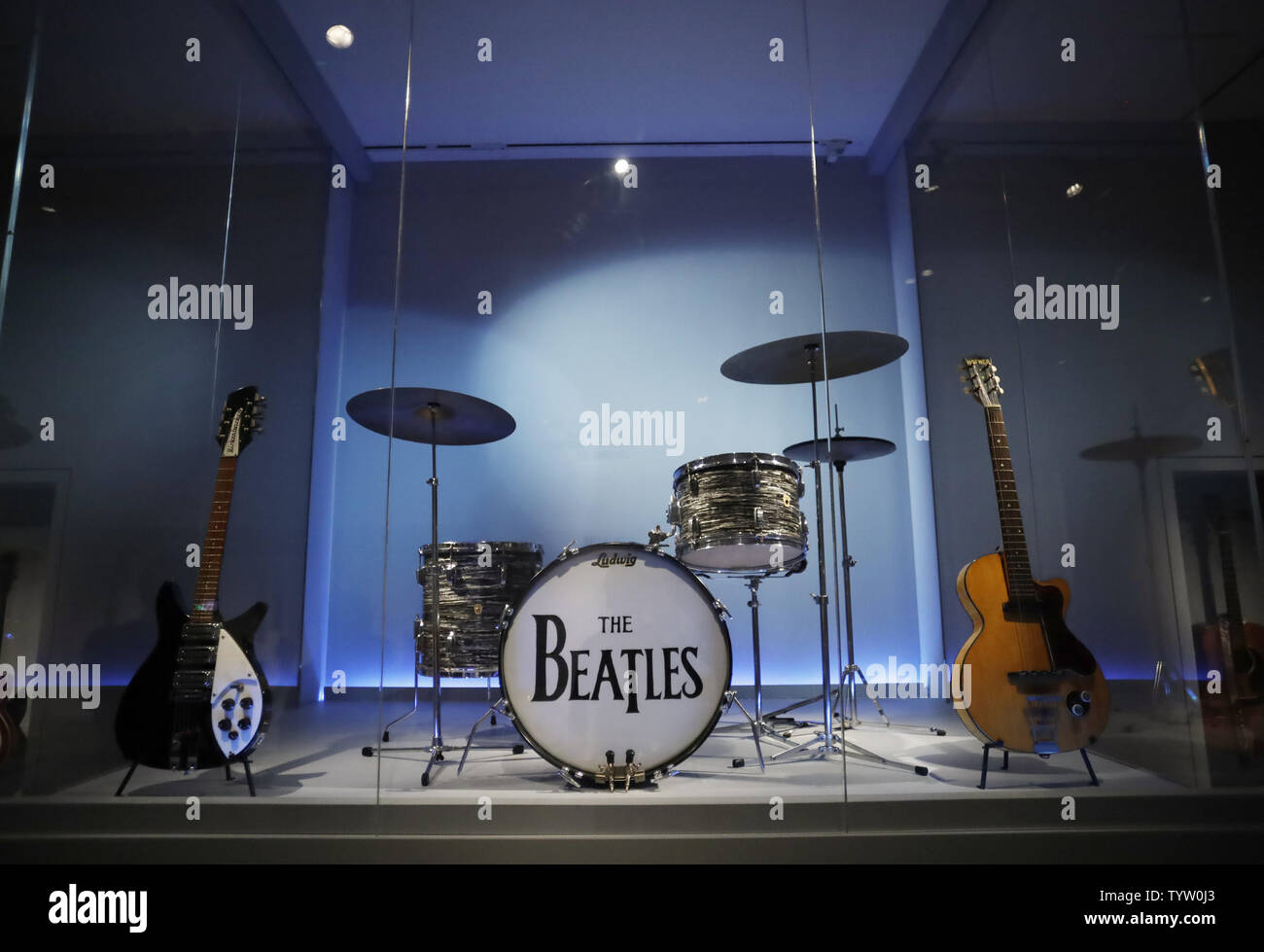 Drums and Guitars from The Beatles are on display at a press preview ...