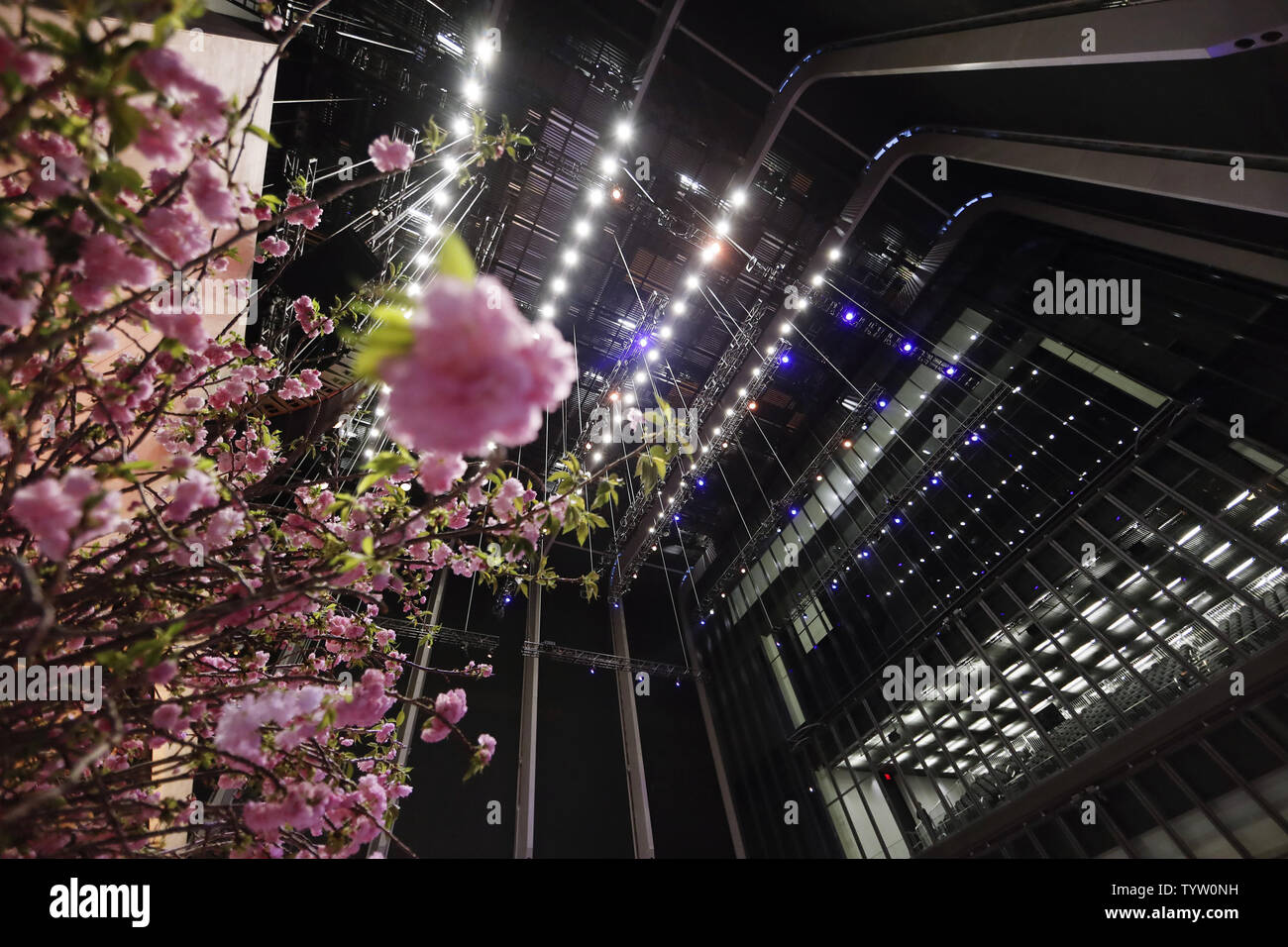 Flowers are in bloom in the McCourt Performance Space at a press ...