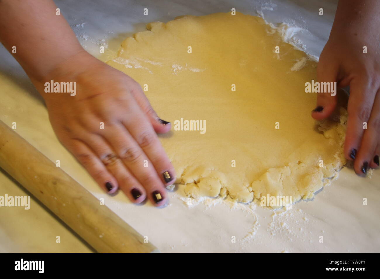 Rolling out puff pastry hi-res stock photography and images - Alamy