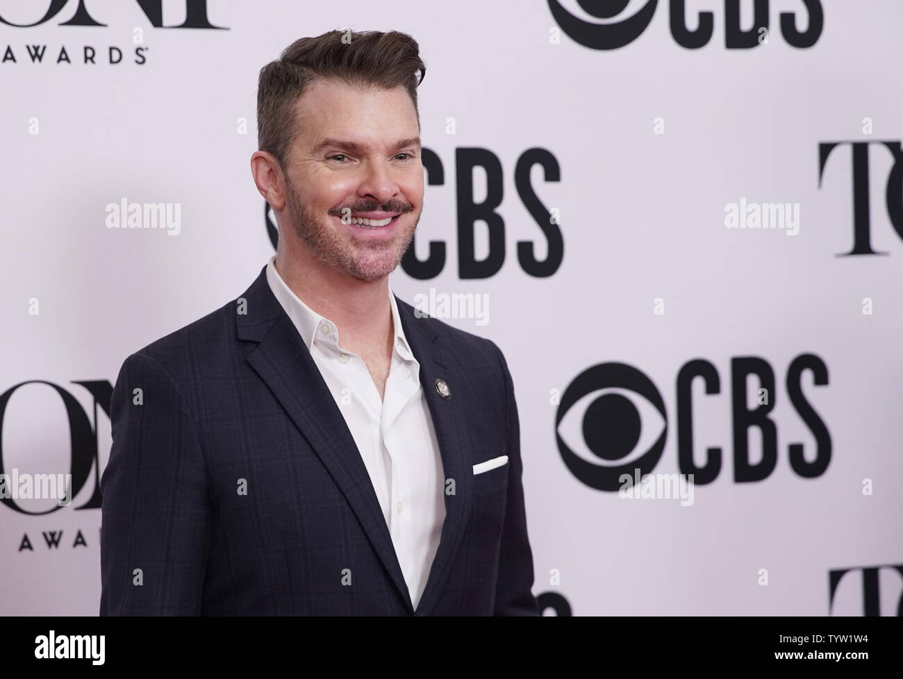 Denis Jones arrives on the red carpet at The 73rd Annual Tony Awards ...