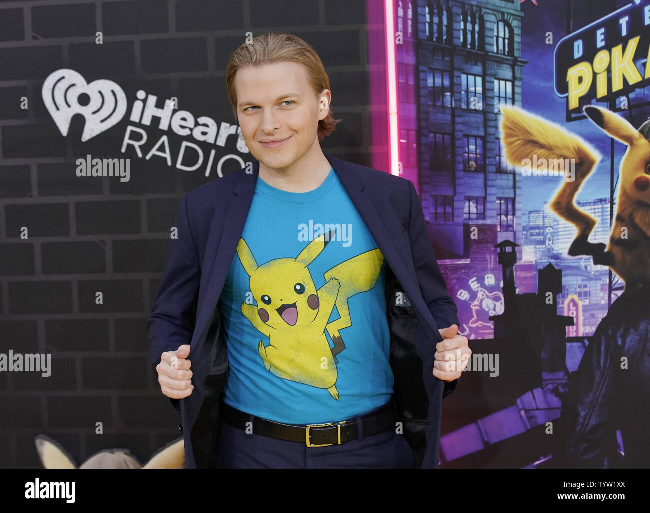 Ronan Farrow arrives on the red carpet at the Pokemon Detective Pikachu ...