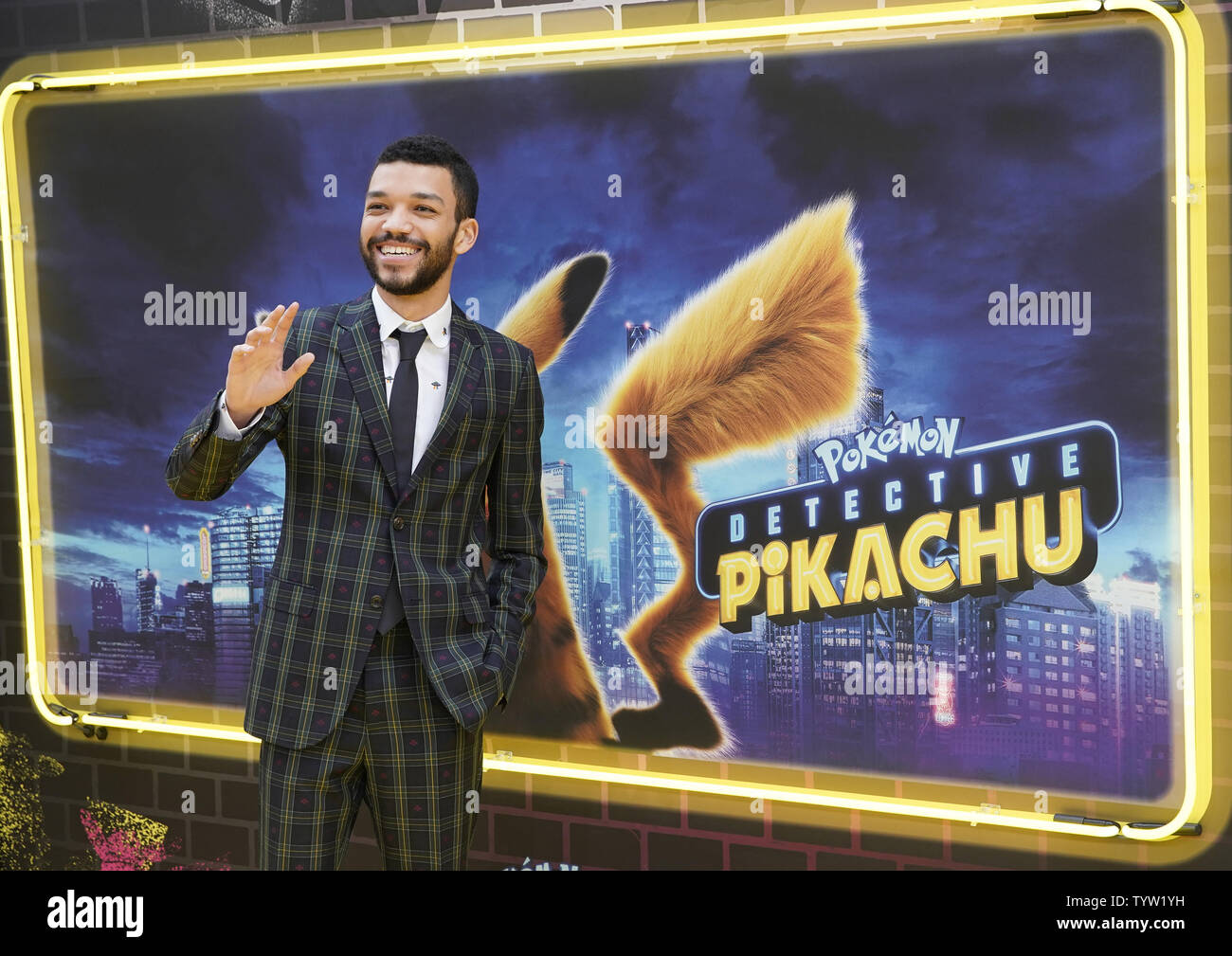 Justice Smith arrives on the red carpet at the Pokemon Detective ...
