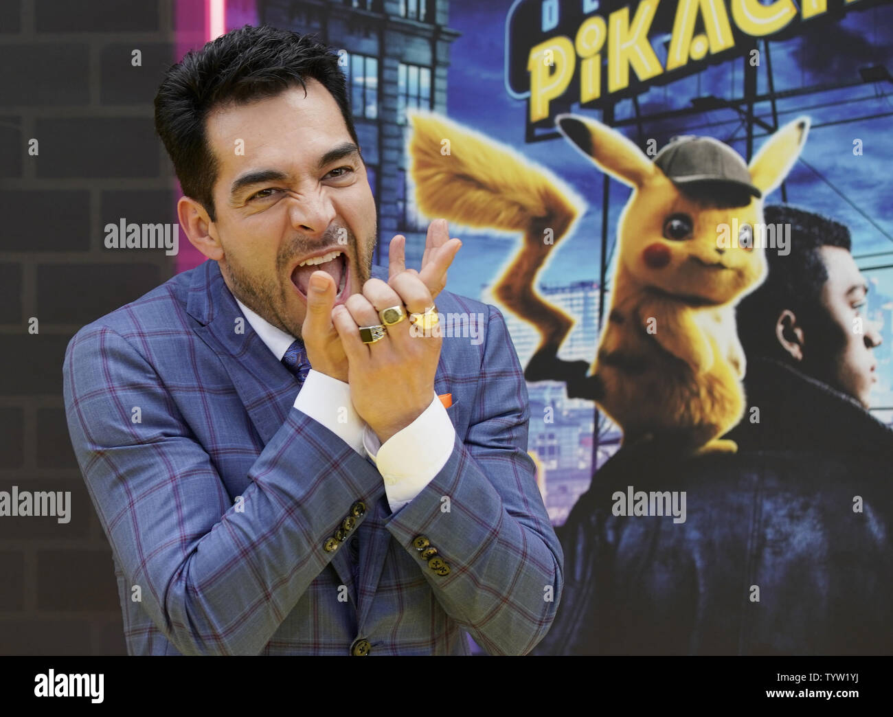Omar Chaparro arrives on the red carpet at the Pokemon Detective ...