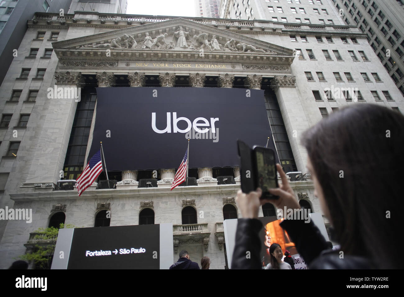 The Uber Logo hangs outside at the NYSE before the opening bell at the ...