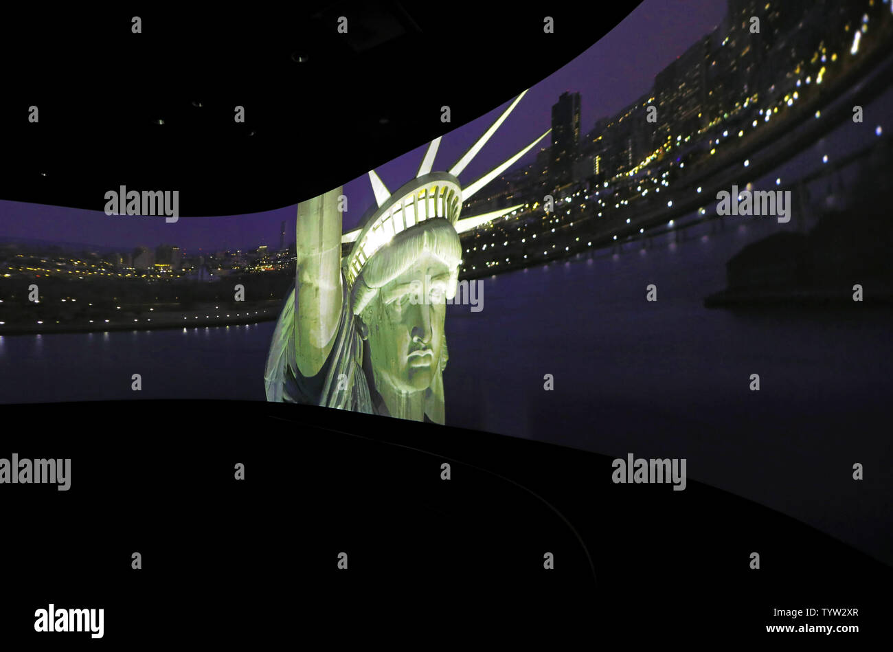 Images of the Statue of Liberty displayed at the Immersive Theater at a ...