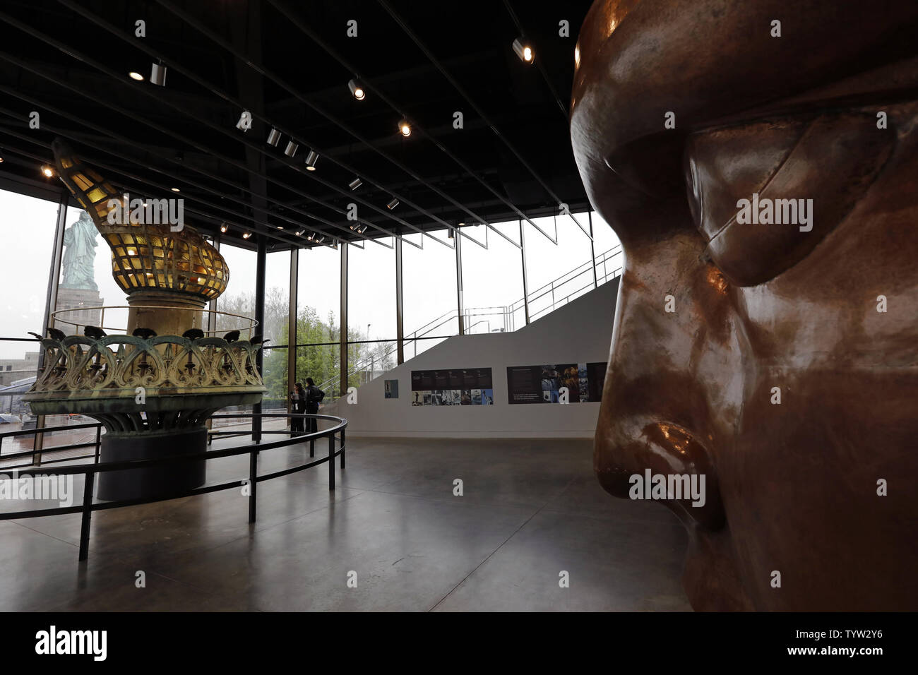 The Original Torch from the Statue of Liberty (L) and a full scale ...