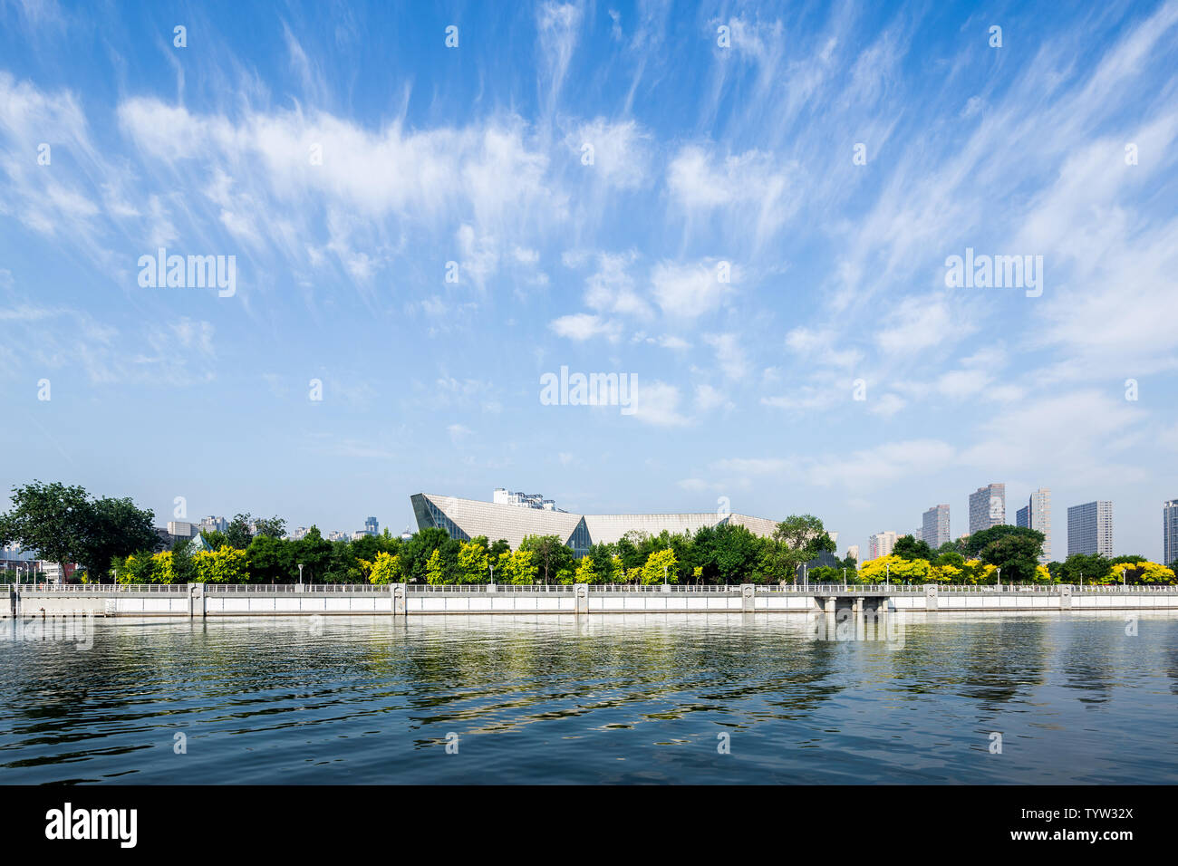 Modern skyline at riverbank Stock Photo - Alamy
