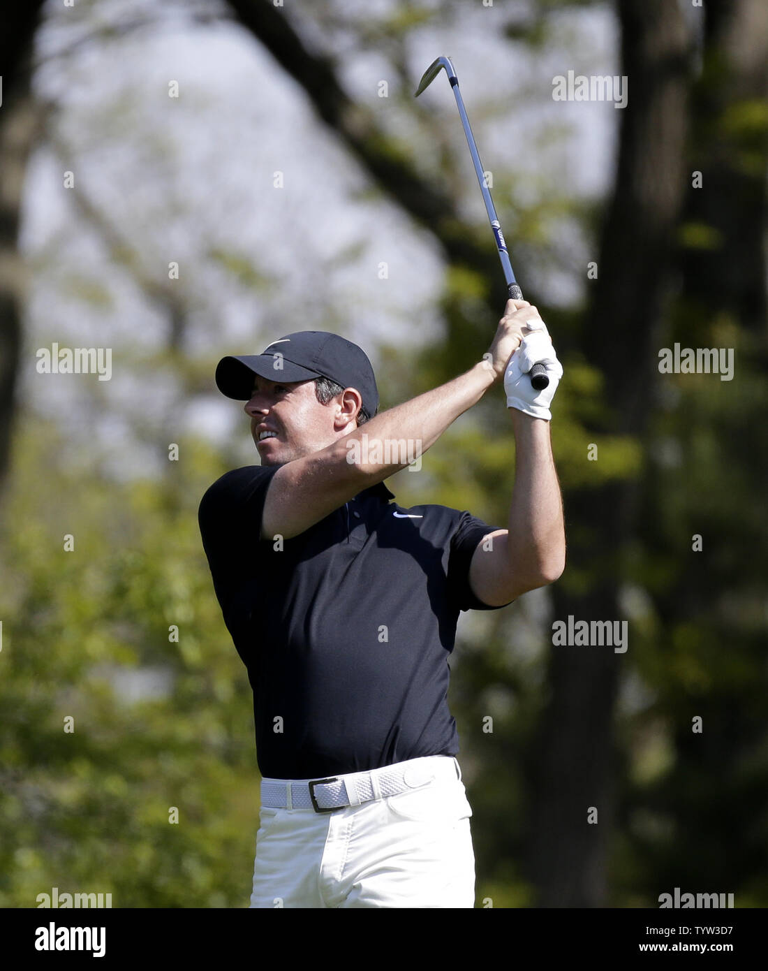 Rory McIIroy of Northern Ireland hits his tee shot on the 14th hole in ...