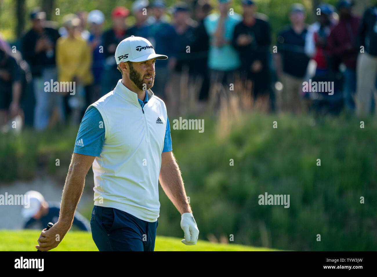 Dustin Johnson walks on 13 during the second round at the PGA ...