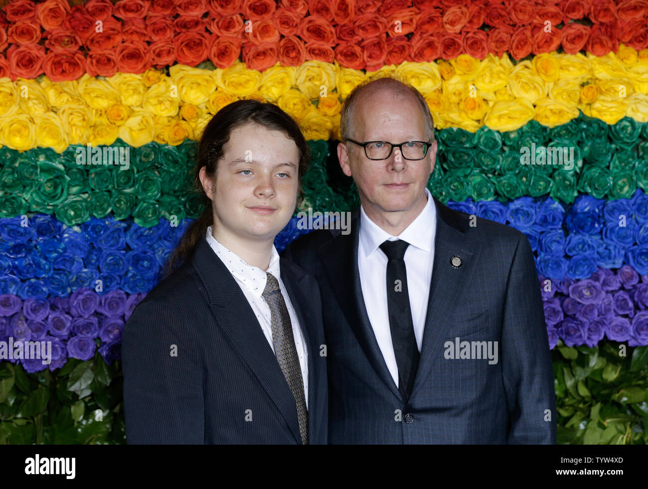 Tal Yarden (R) arrives on the red carpet at The 73rd Annual Tony Awards ...