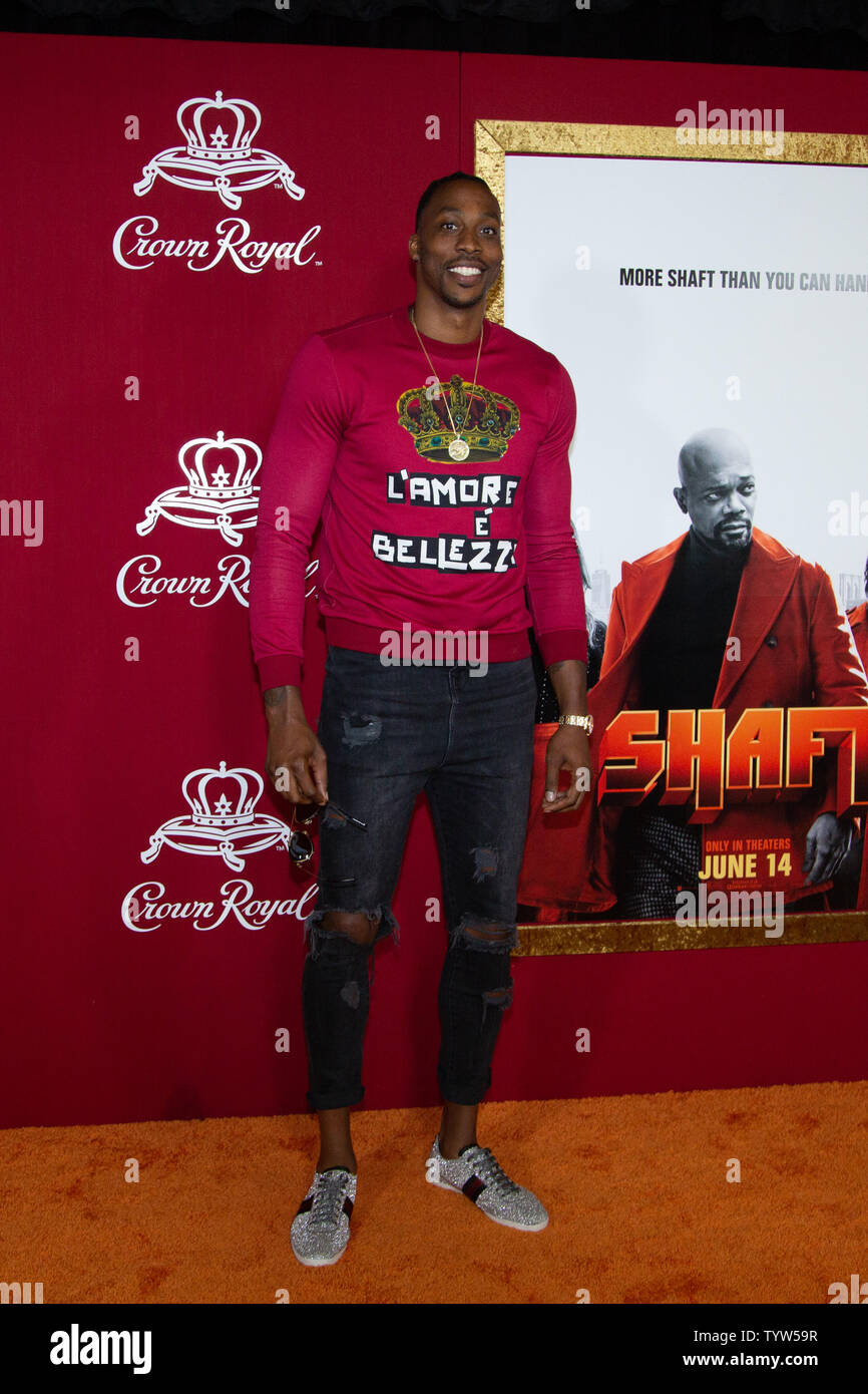 Dwight Howard arrives on the red carpet at the premiere of New Line ...