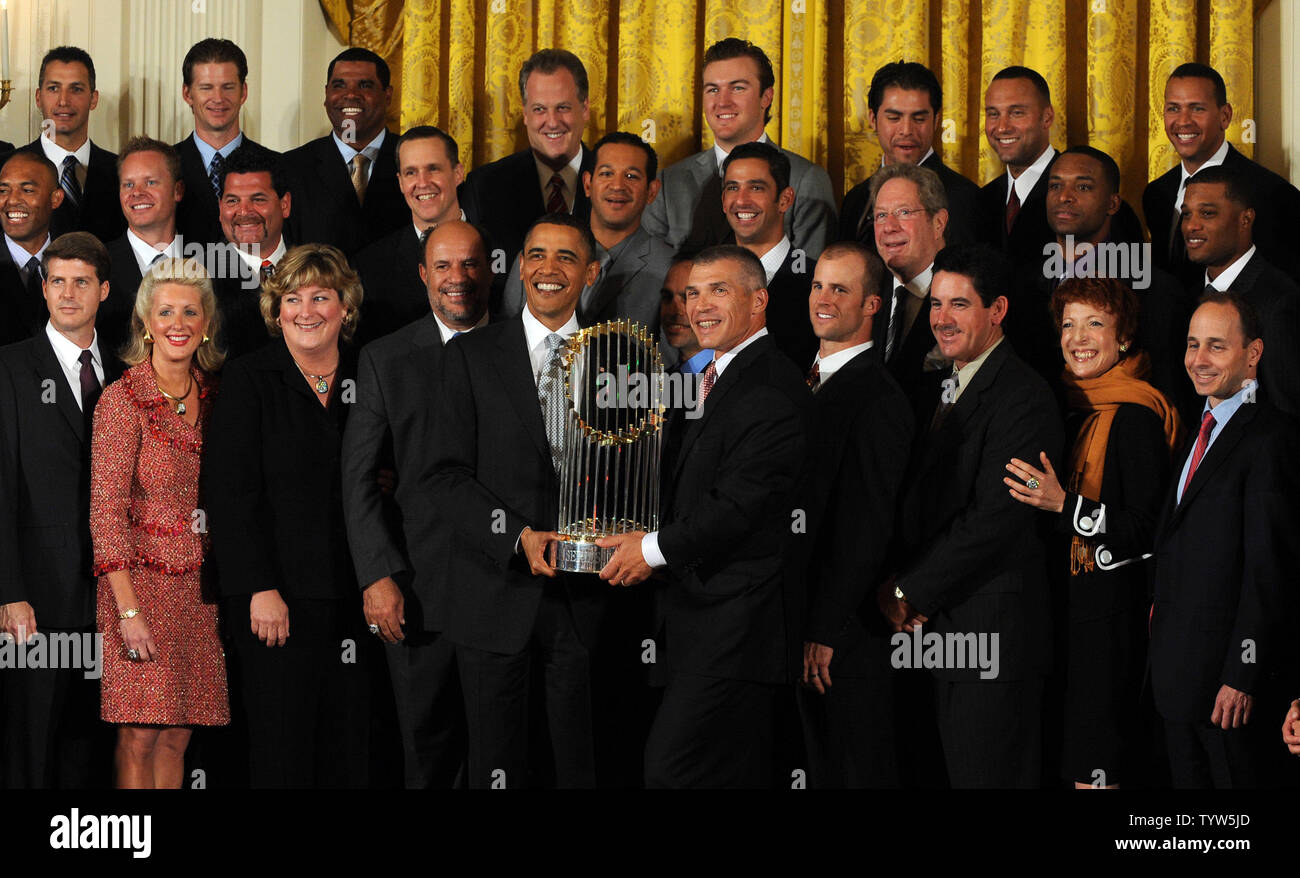 U.S. President Barack Obama and Yankees Manager Joe Girardi hold the ...