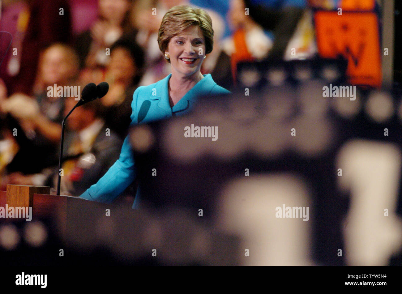First Lady Laura Bush smiles at delegates after her speech to the ...