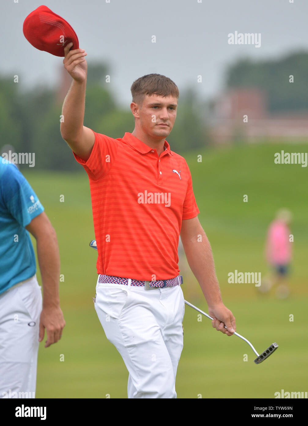 Bryson DeChambeau reacts after putting on the 15th green during the ...