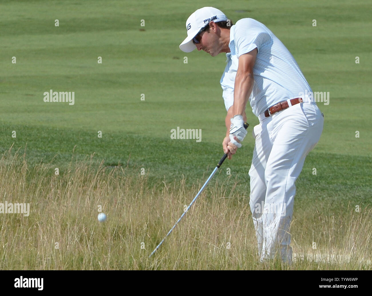 Andrew Landry hits a shot from around the church pew bunkers on the 4th ...