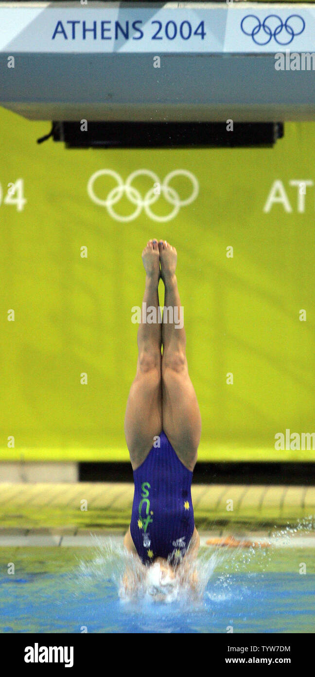 An Australian diver tests the water at the aquatics venue at the Athens ...