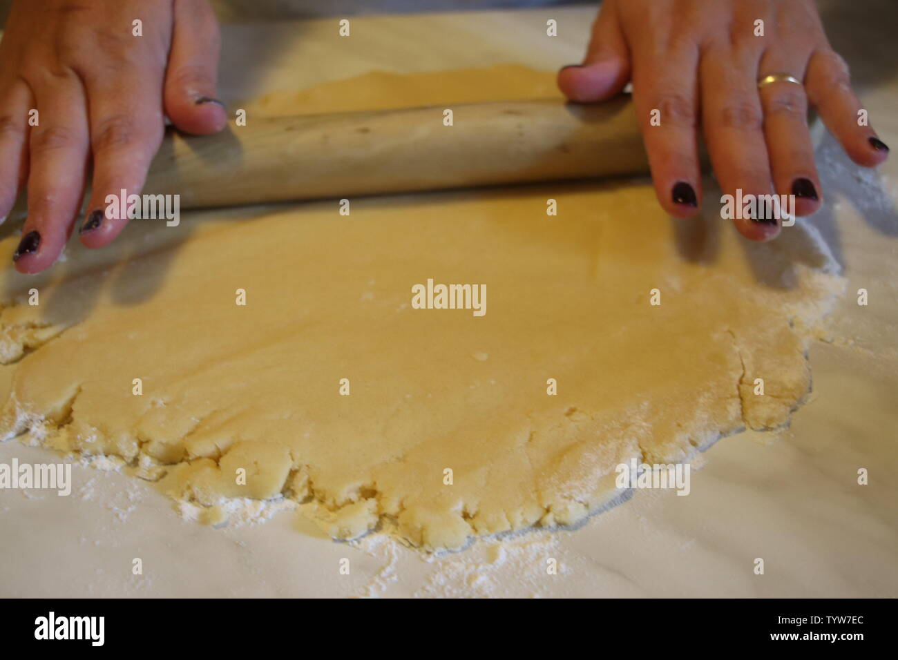 Rolling out the pastry hi-res stock photography and images - Alamy