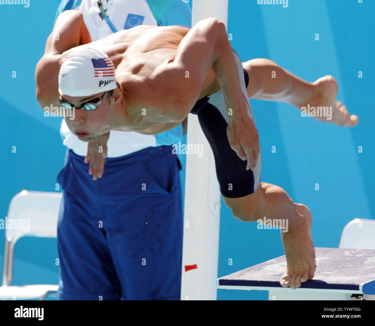 American swimmer Michael Phelps launches into the pool for his 200 ...