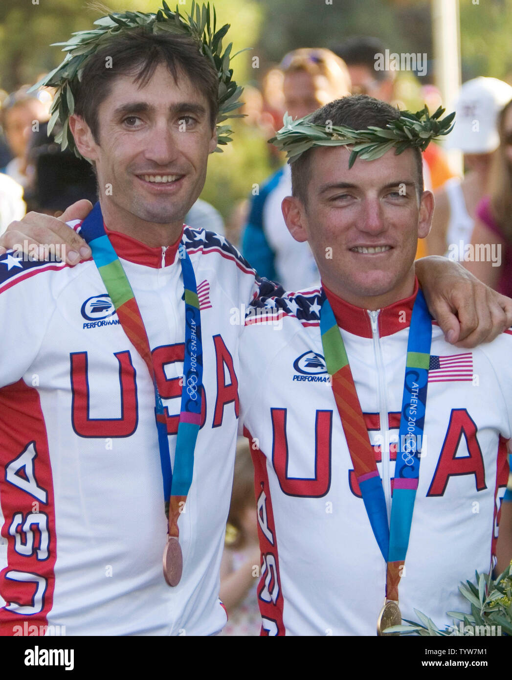 The USA's Tyler Hamilton (R.) wins gold while team mate Bobby Julich ...