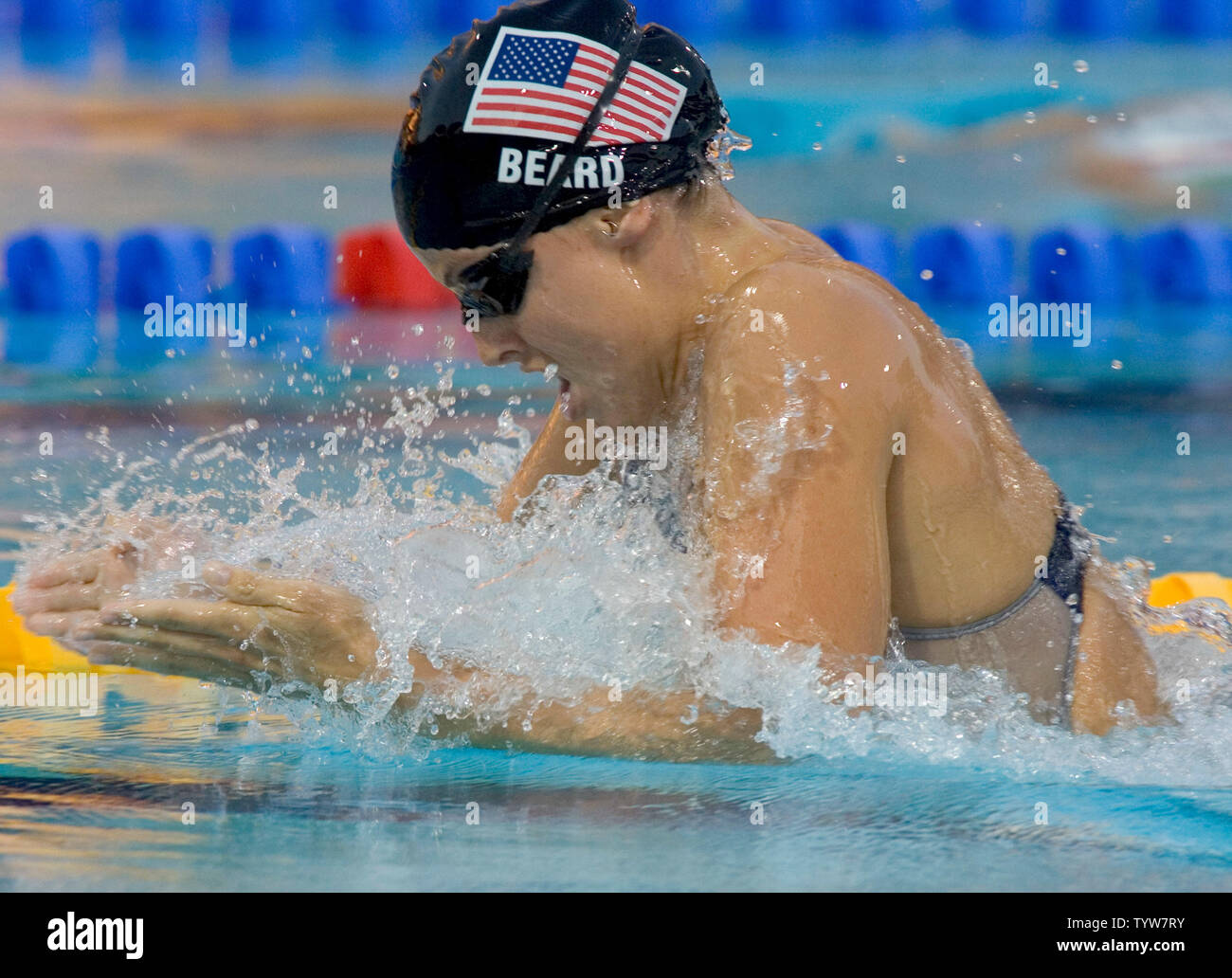 Amanda Beard of the USA wins gold and sets an Olympic Record in the ...