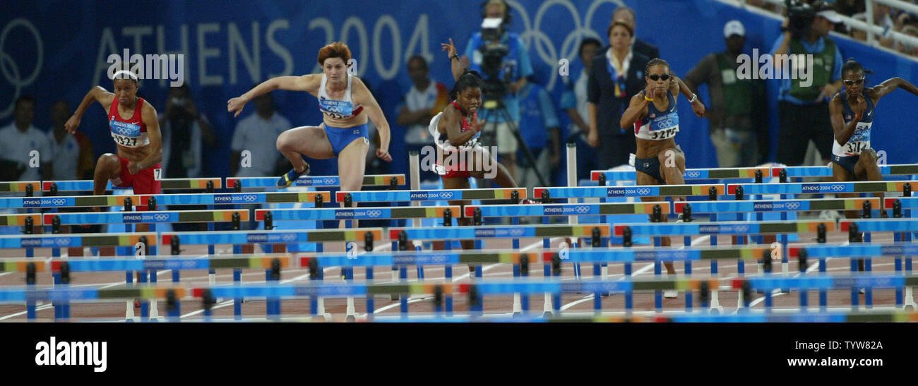 Canada's Perdita Felicien (center) the gold medal favourite crashes on ...