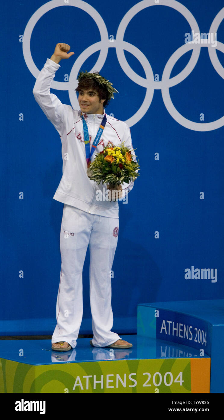 Canada's Alexandre Despatie on the podium after winning silver in the ...