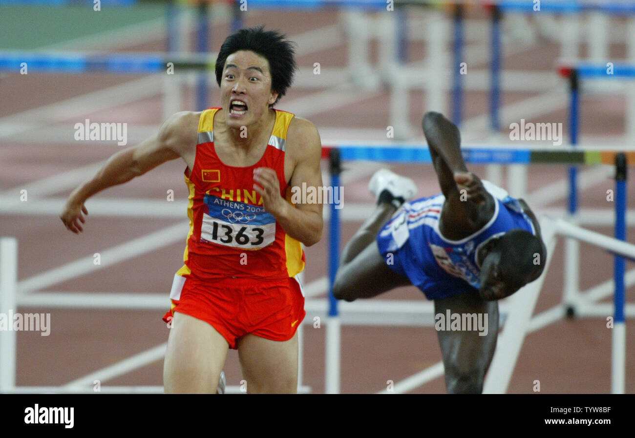 Xiang Lui of China sets an Olympic record and equals the world record ...