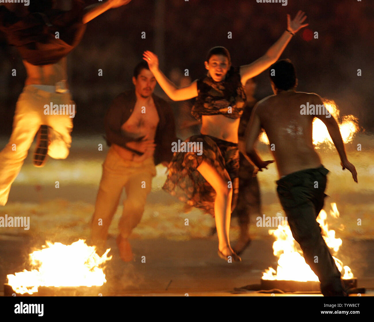 Greek fire dancers heat up the cultural festivities in the closing ...