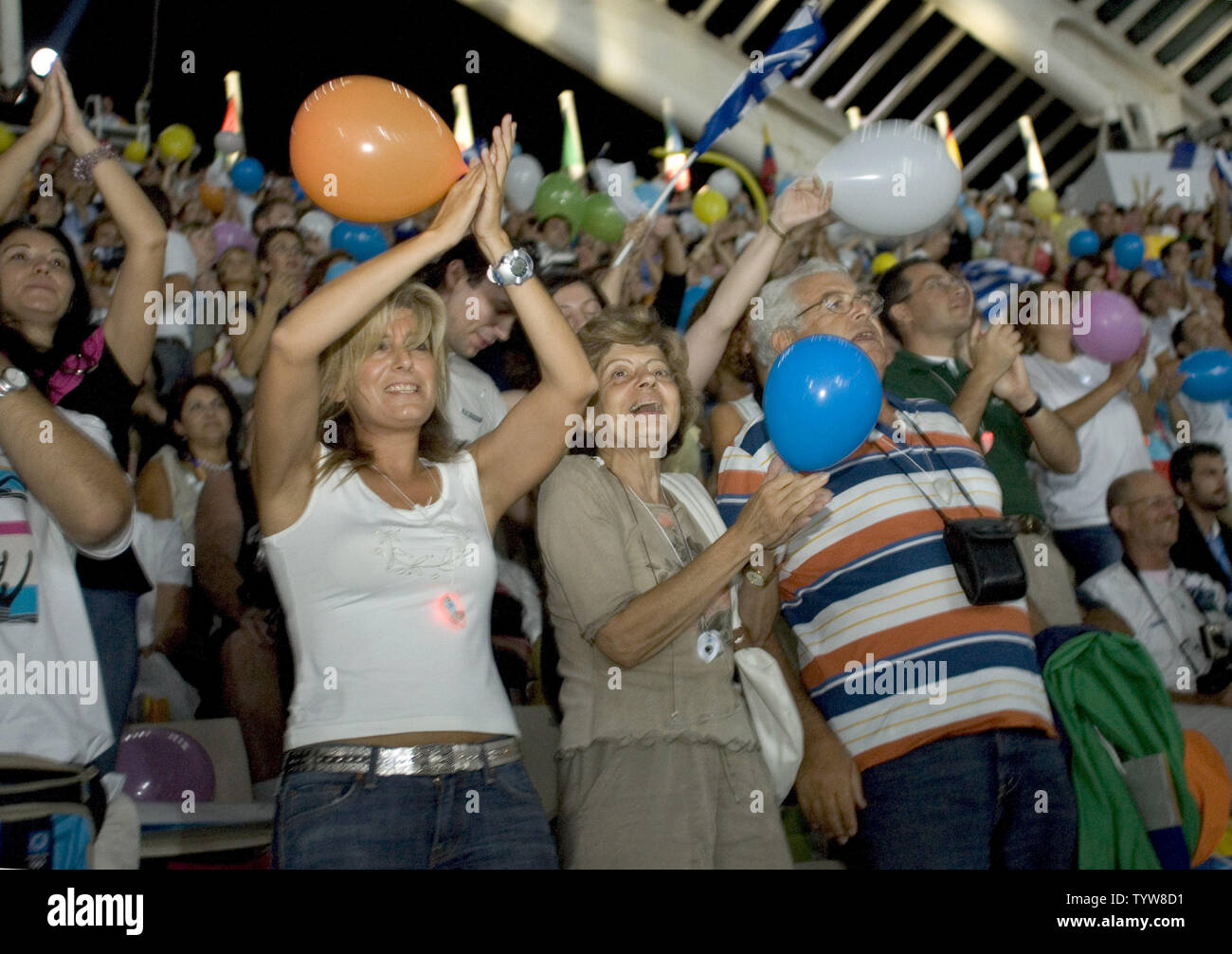 Cheering spectators fill the stands at the closing ceremonies in the ...