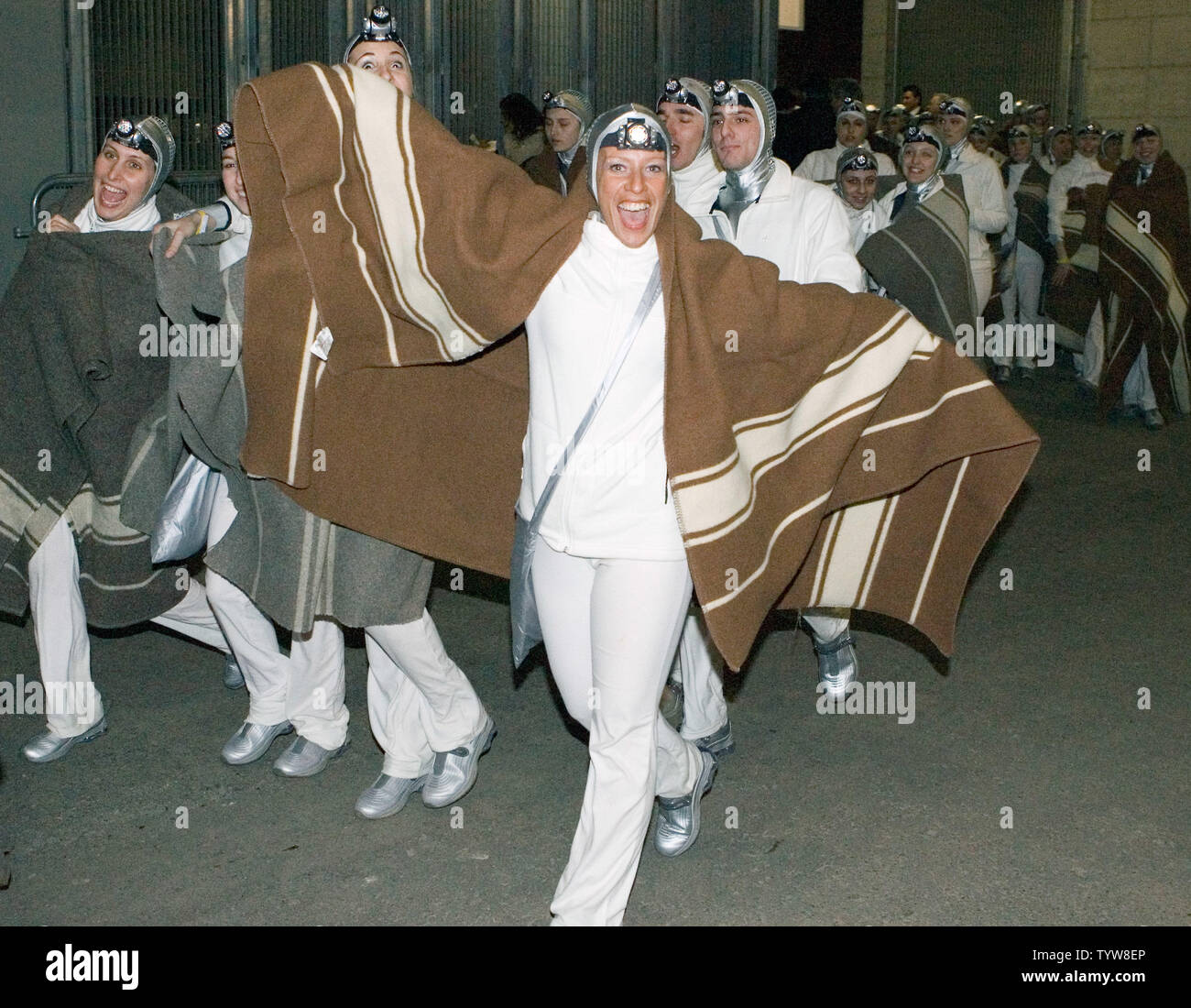 Performers arrive to the Olympic Stadium for the start of the Opening ...