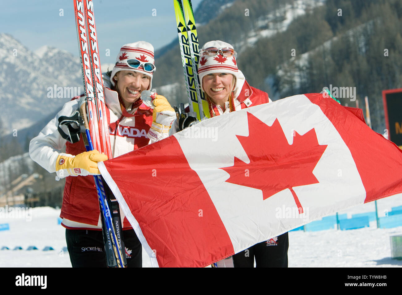 Canada's Becky Scott (L) and Sara Renner celebrate winning silver in ...