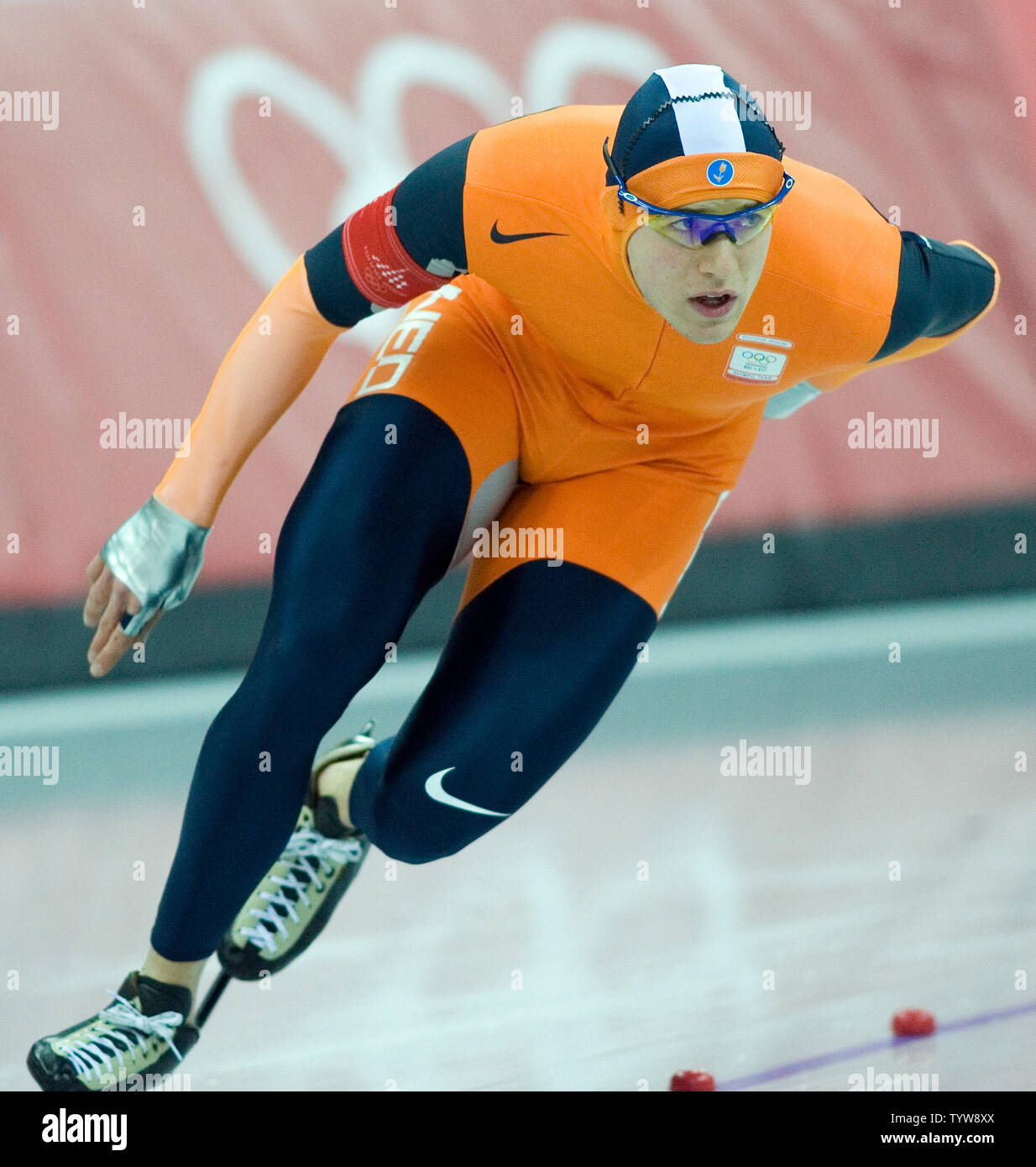 Simon Kuipers of the Nederlands loses his race to Italy's Enrico Fabris ...