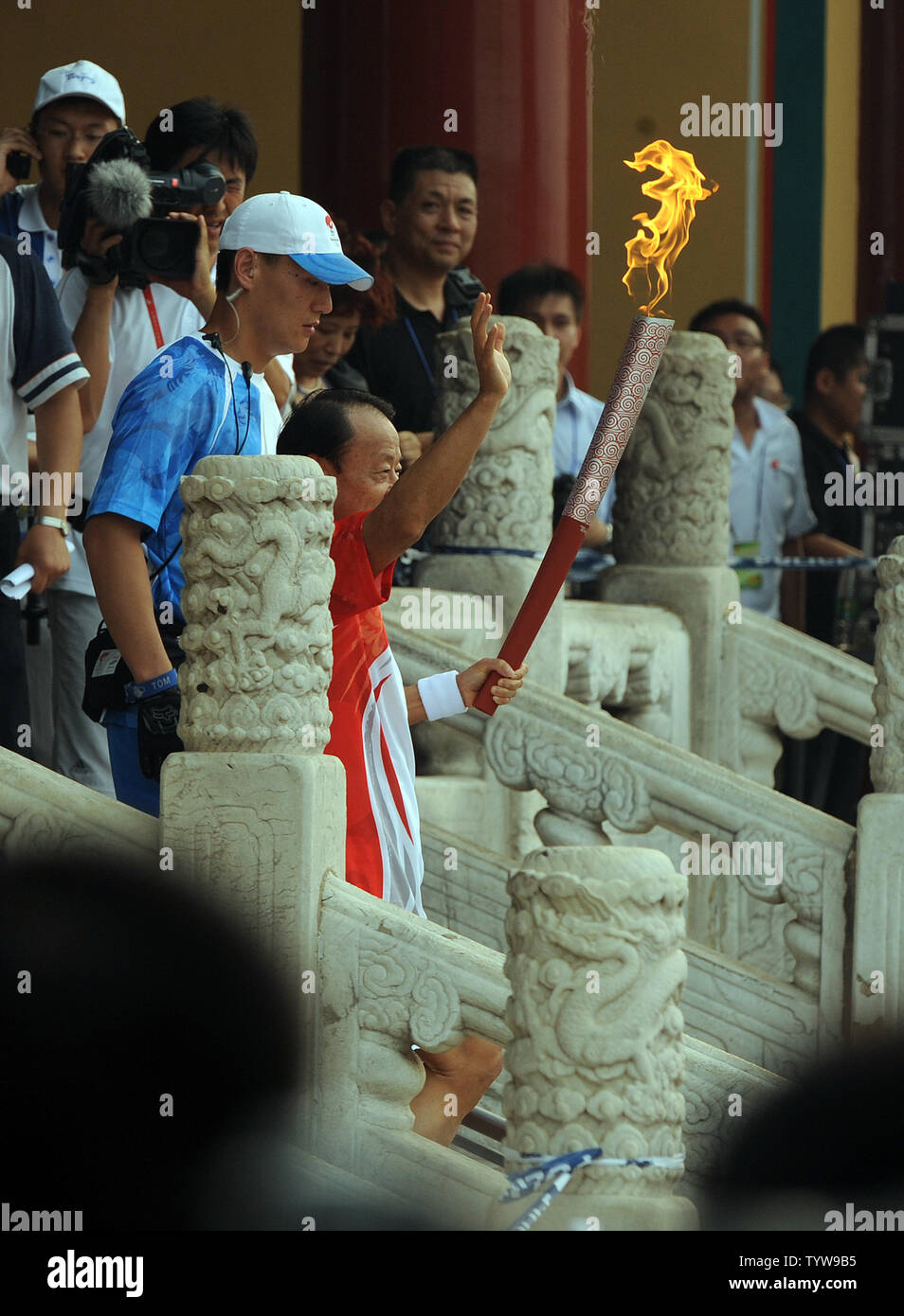 The Olympic Flame arrives during an Olympic Torch Ceremony at the ...