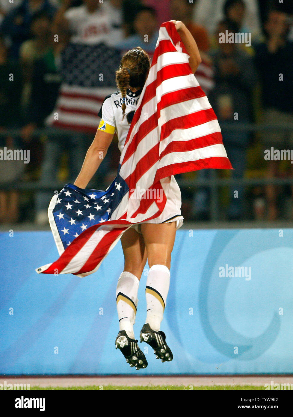 USA's captain Christie Rampone celebrates after her team defeated ...
