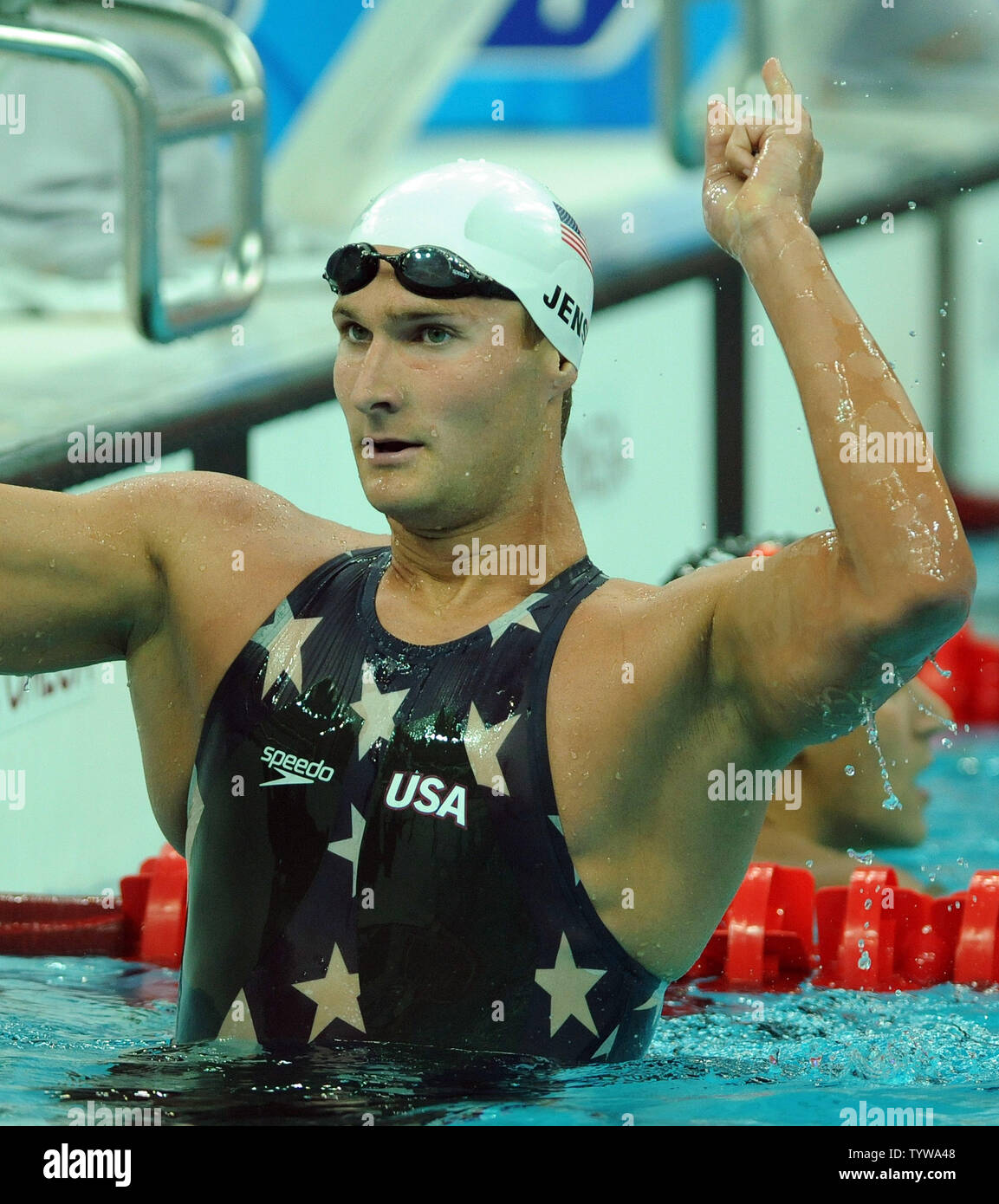 USA's Larsen Jensen points to the sky after competing in Heat 4 in the ...