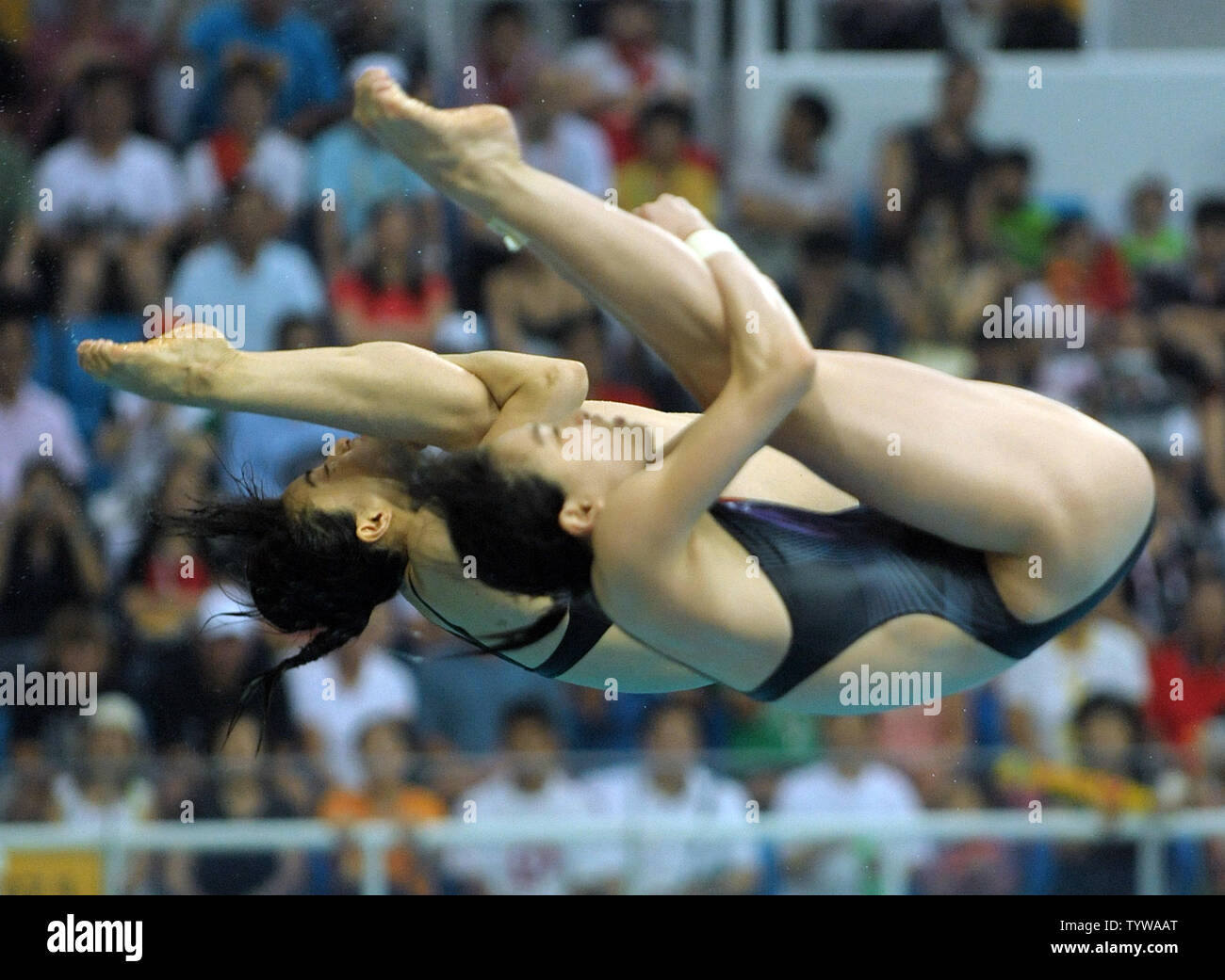 Chinese divers Jingjing Guo and Minxia Wu dive for gold in Women's 3 ...