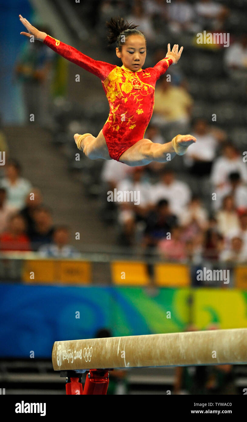 Chinese gymnast Deng Linlin goes through her routine on the beam during ...