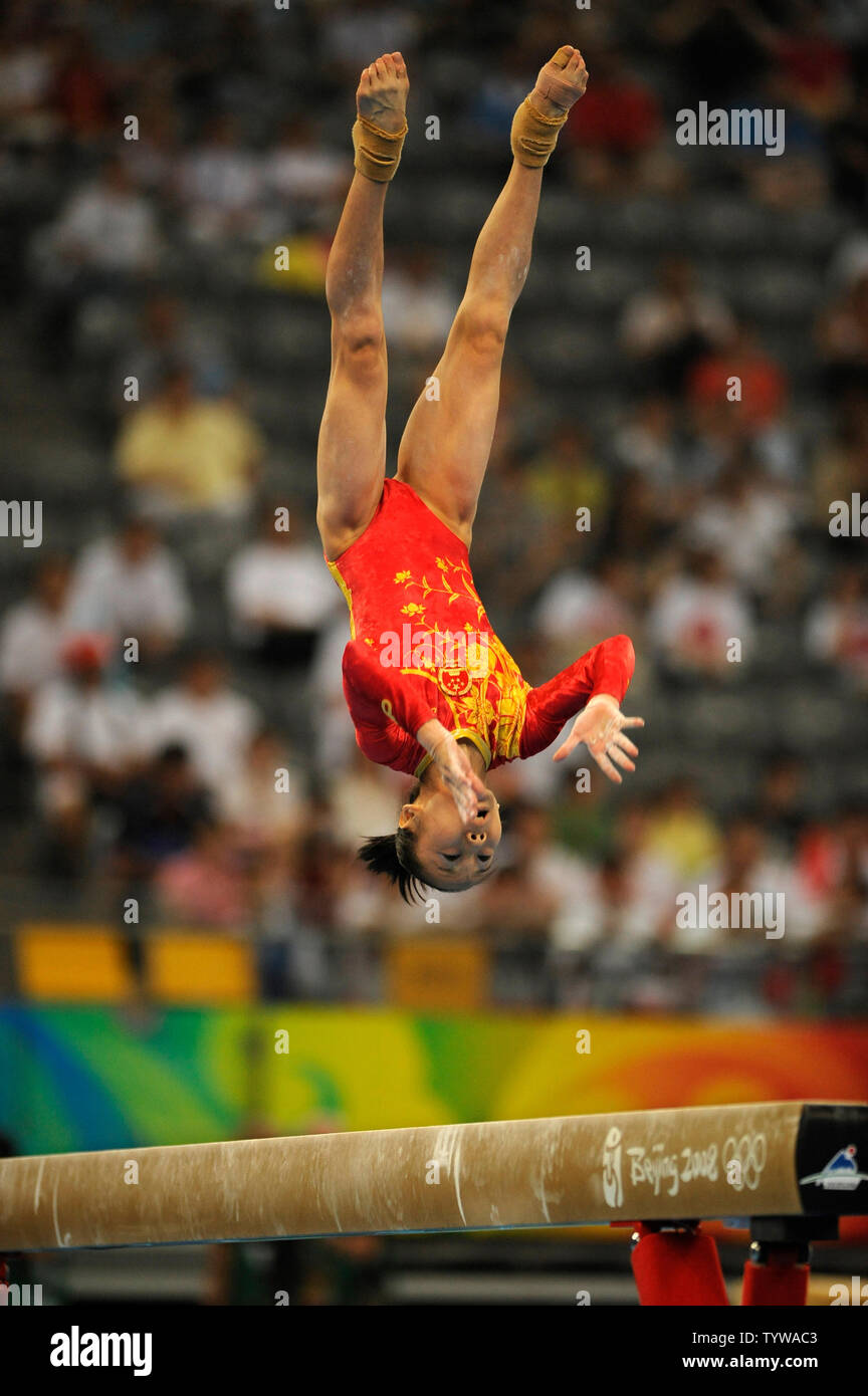 Chinese gymnast Deng Linlin goes through her routine on the beam during ...